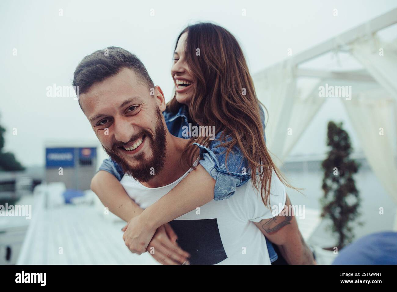 Woman carries man in hi-res stock photography and images - Alamy