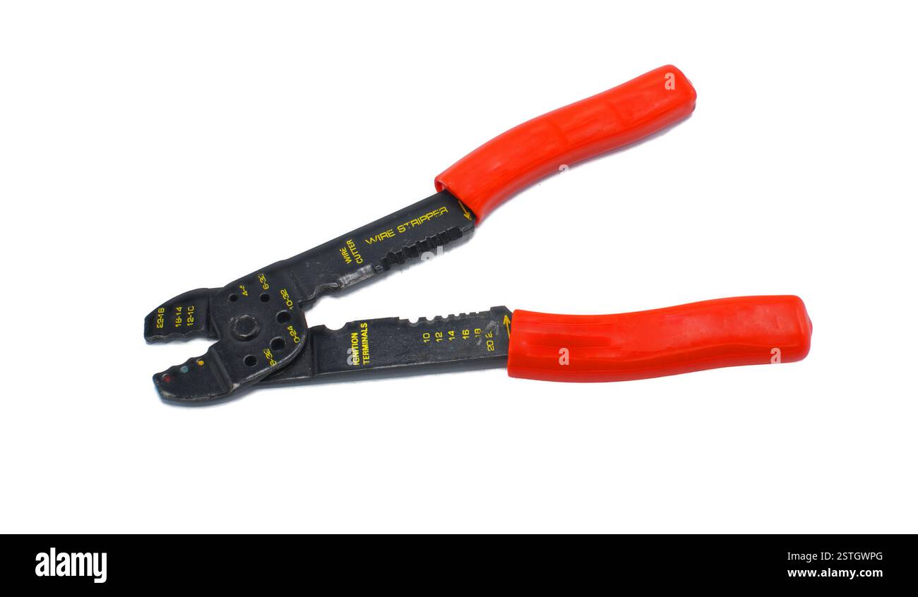 wire stripper or wire cutter with red rubber handles isolated on white ...