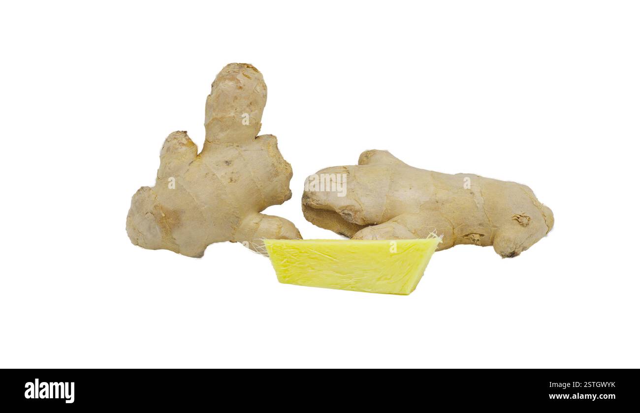 Fresh ginger rhizome root with sliced piece isolated on white ...