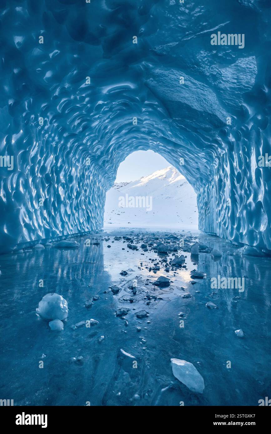 Entrance to a massive ice cave in the Matanuska Glacier of Alaska is a ...