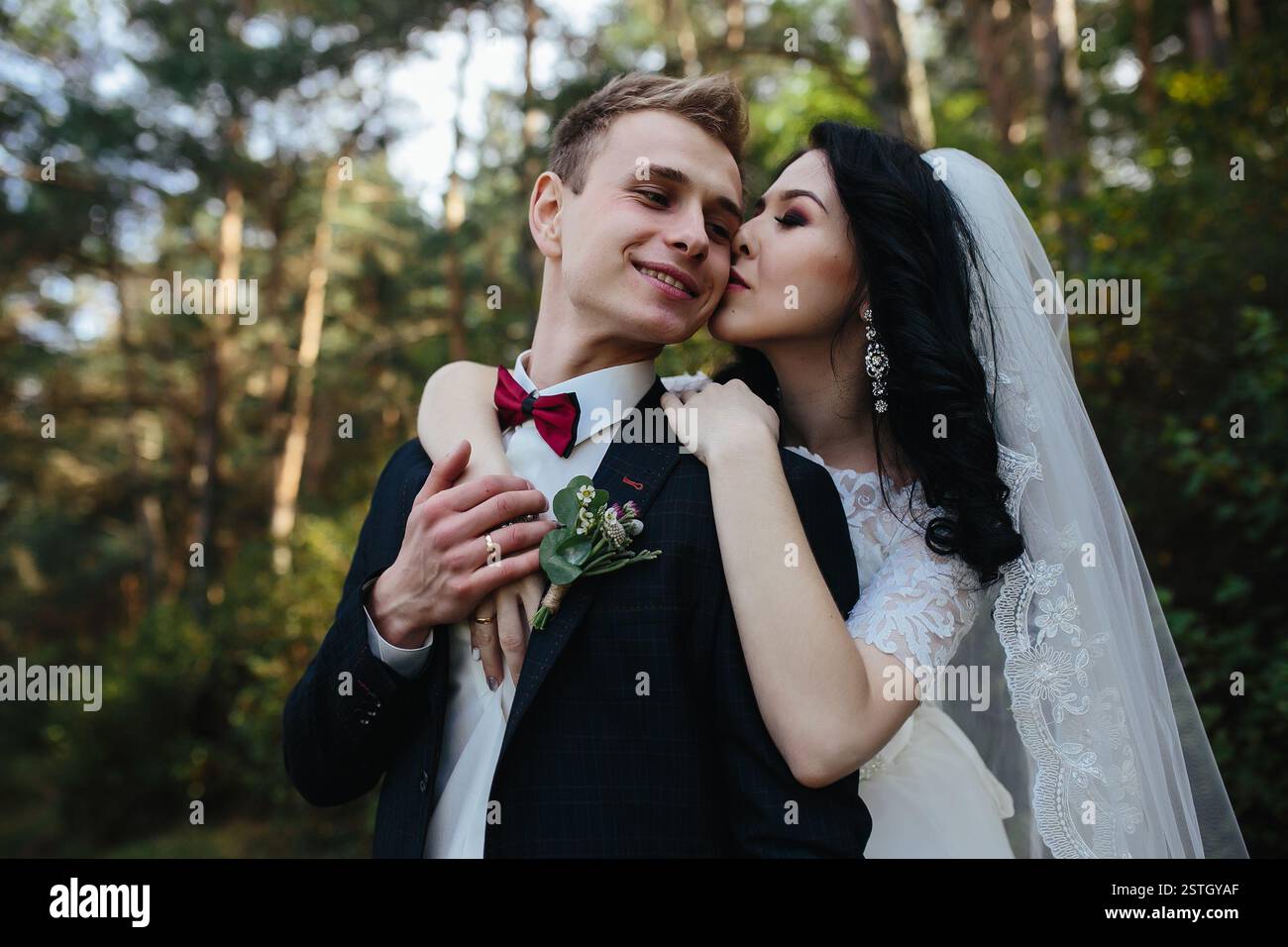 Bridal couple close to each other Stock Photo - Alamy