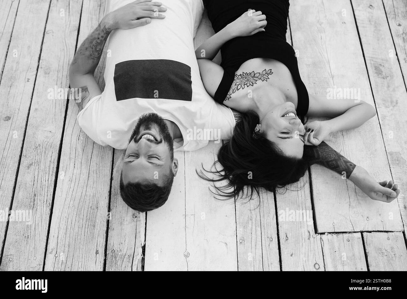 Happy woman embracing female Black and White Stock Photos & Images - Alamy