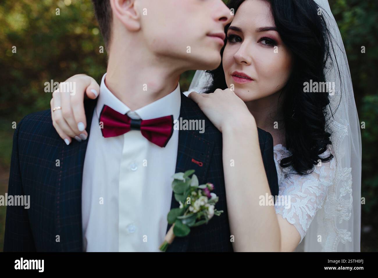 Bridal couple close to each other Stock Photo - Alamy