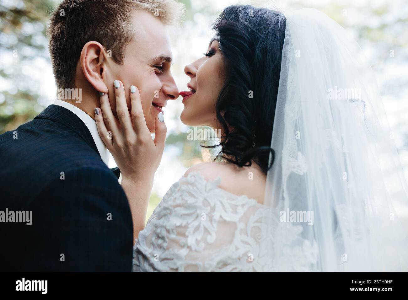 Bridal couple close to each other Stock Photo - Alamy
