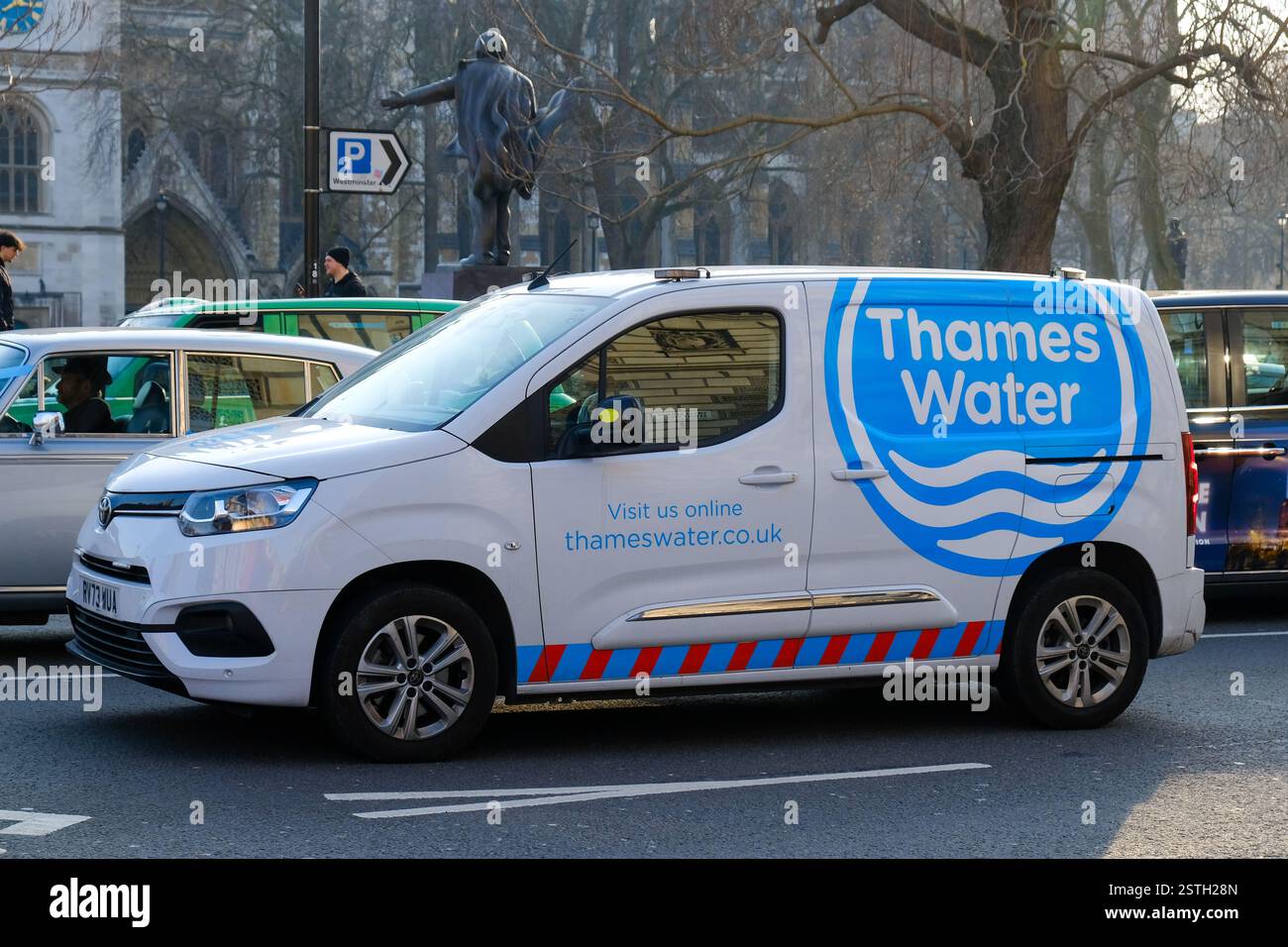 A Thames Water van driving through Parliament Square Stock Photo - Alamy