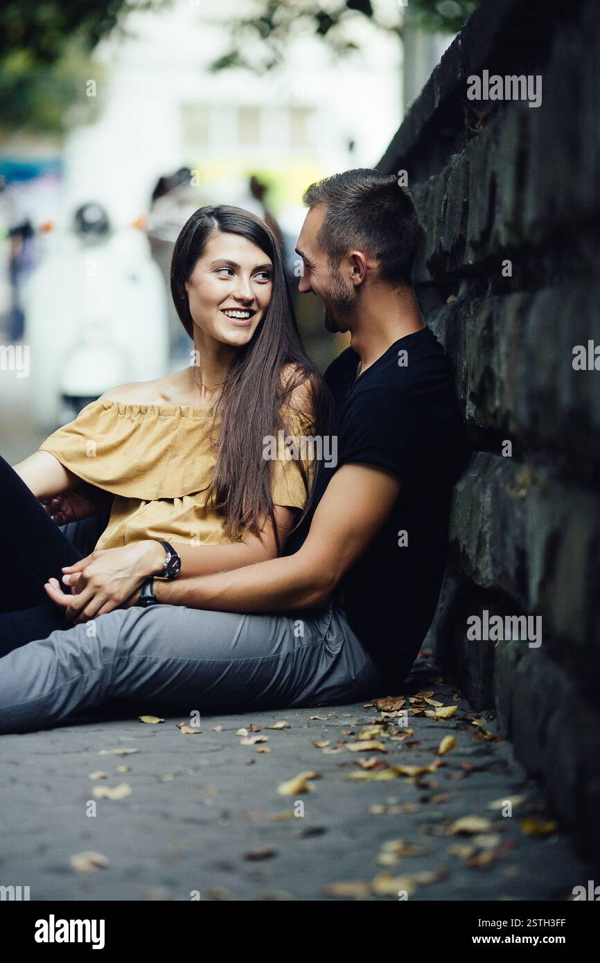 Travel woman sitting on ground hi-res stock photography and images - Alamy