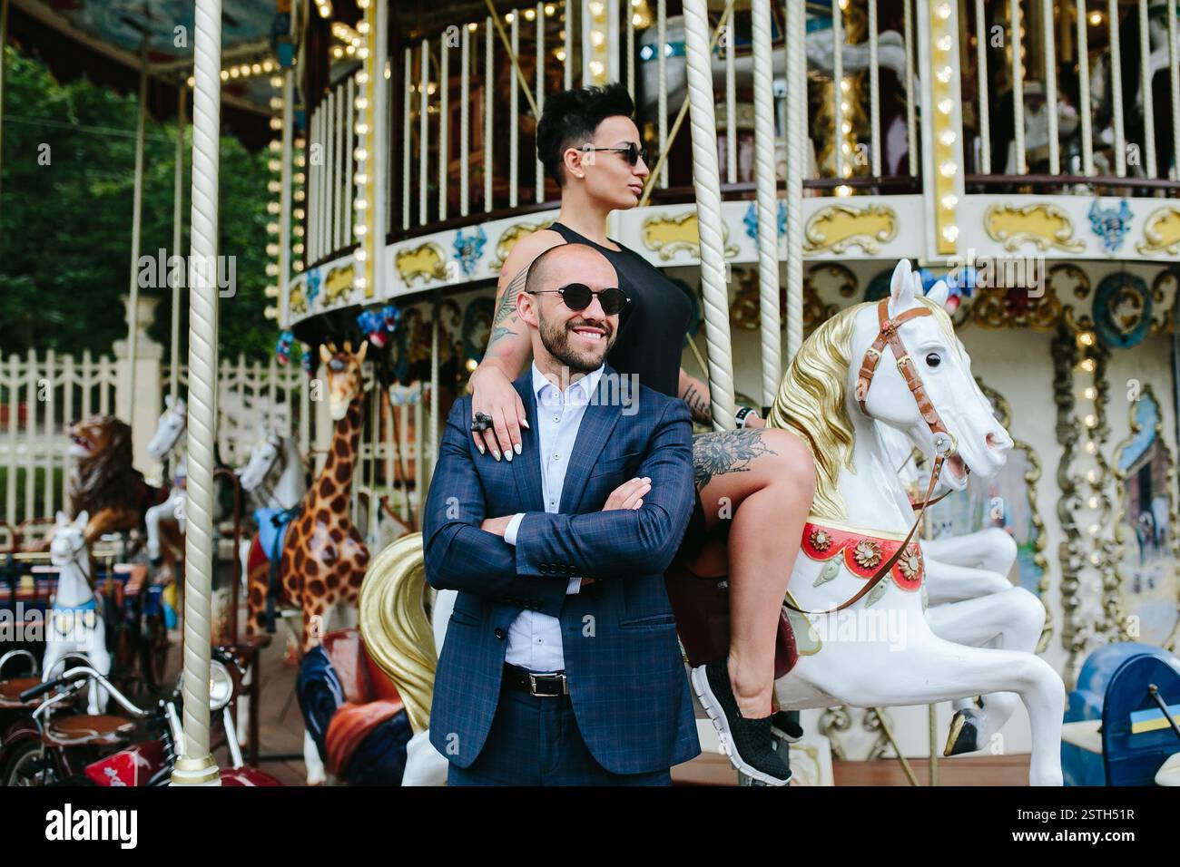 Girl riding on merry go round hi-res stock photography and images - Alamy