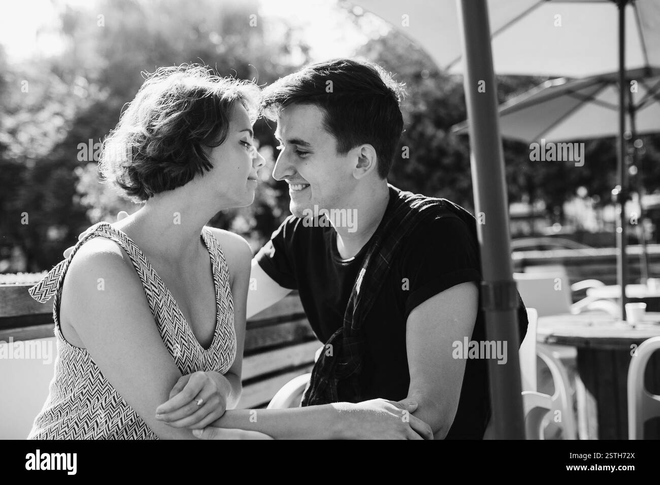 Happy caucasian man male sitting Black and White Stock Photos & Images ...