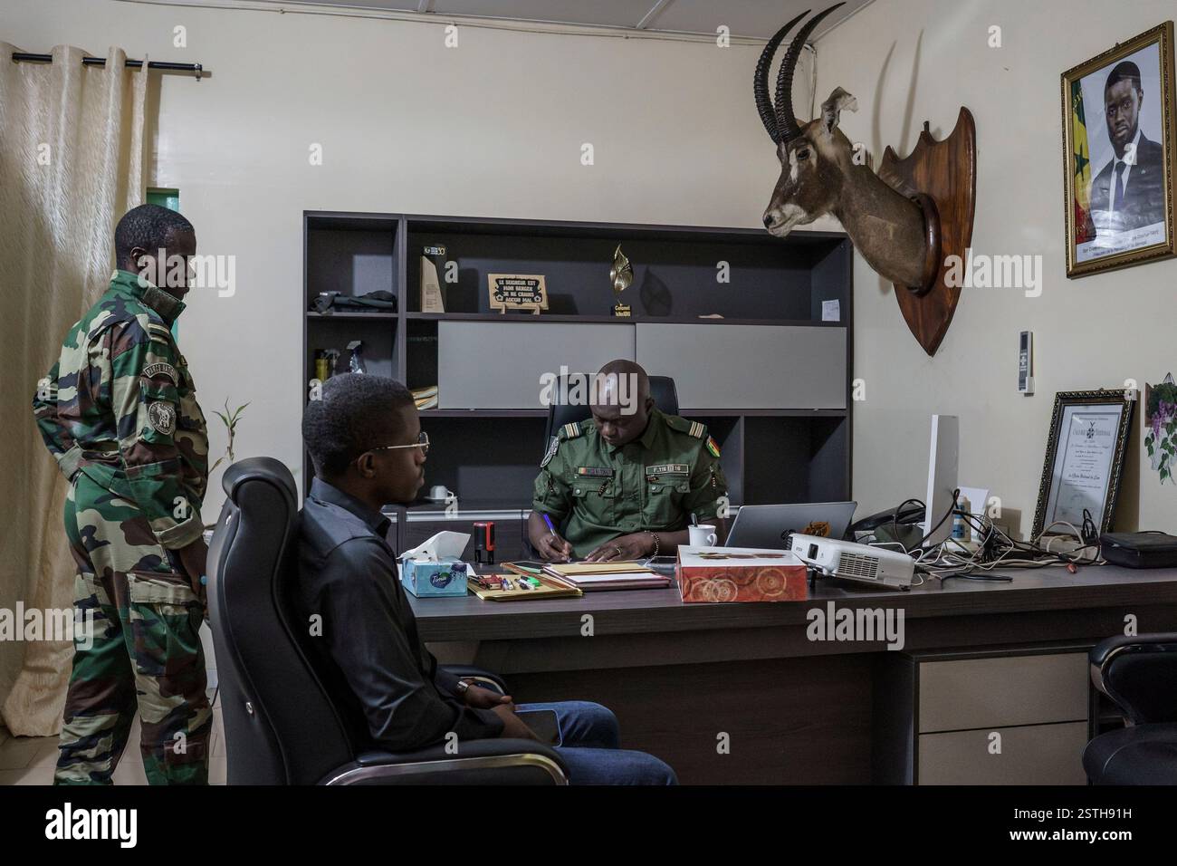 Paul Diedhiou, right, a colonel with Senegal's Direction of National ...