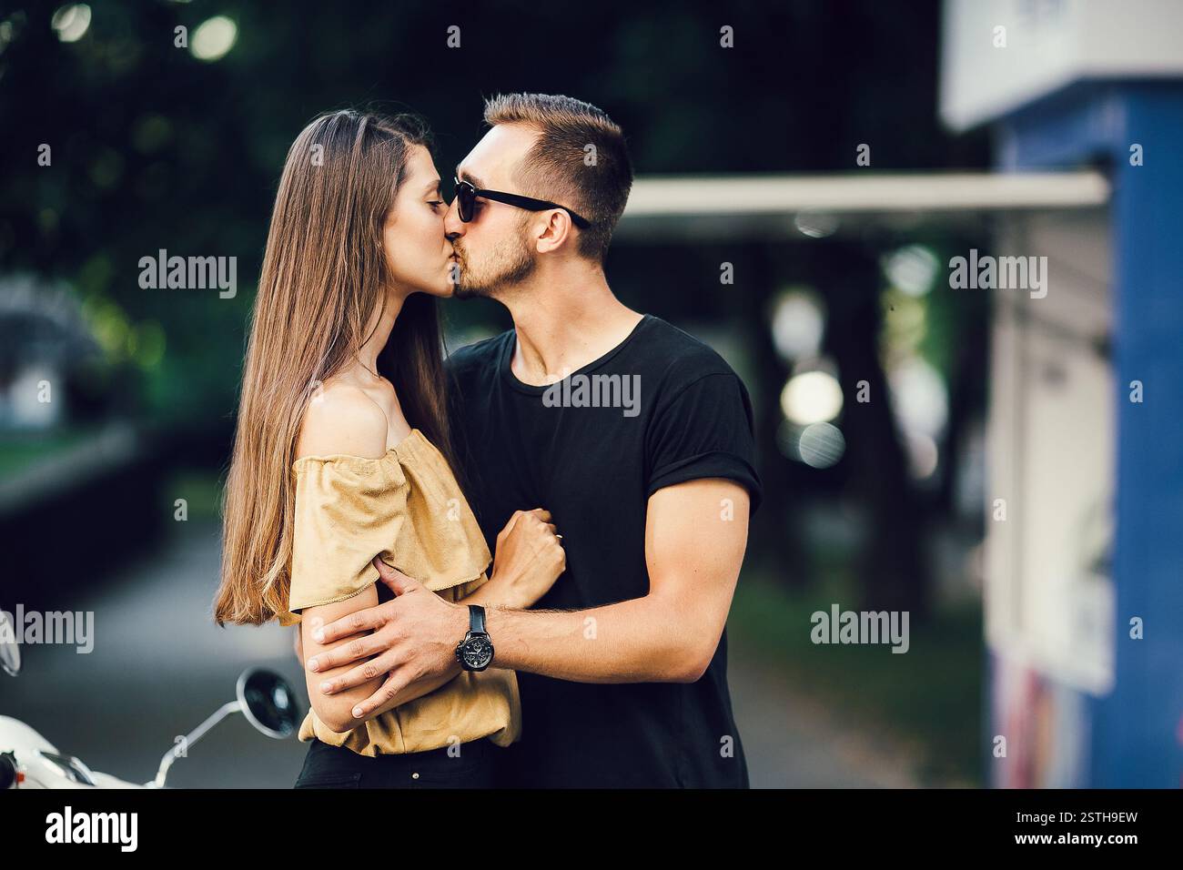 Woman kissing cute smiling hi-res stock photography and images - Alamy