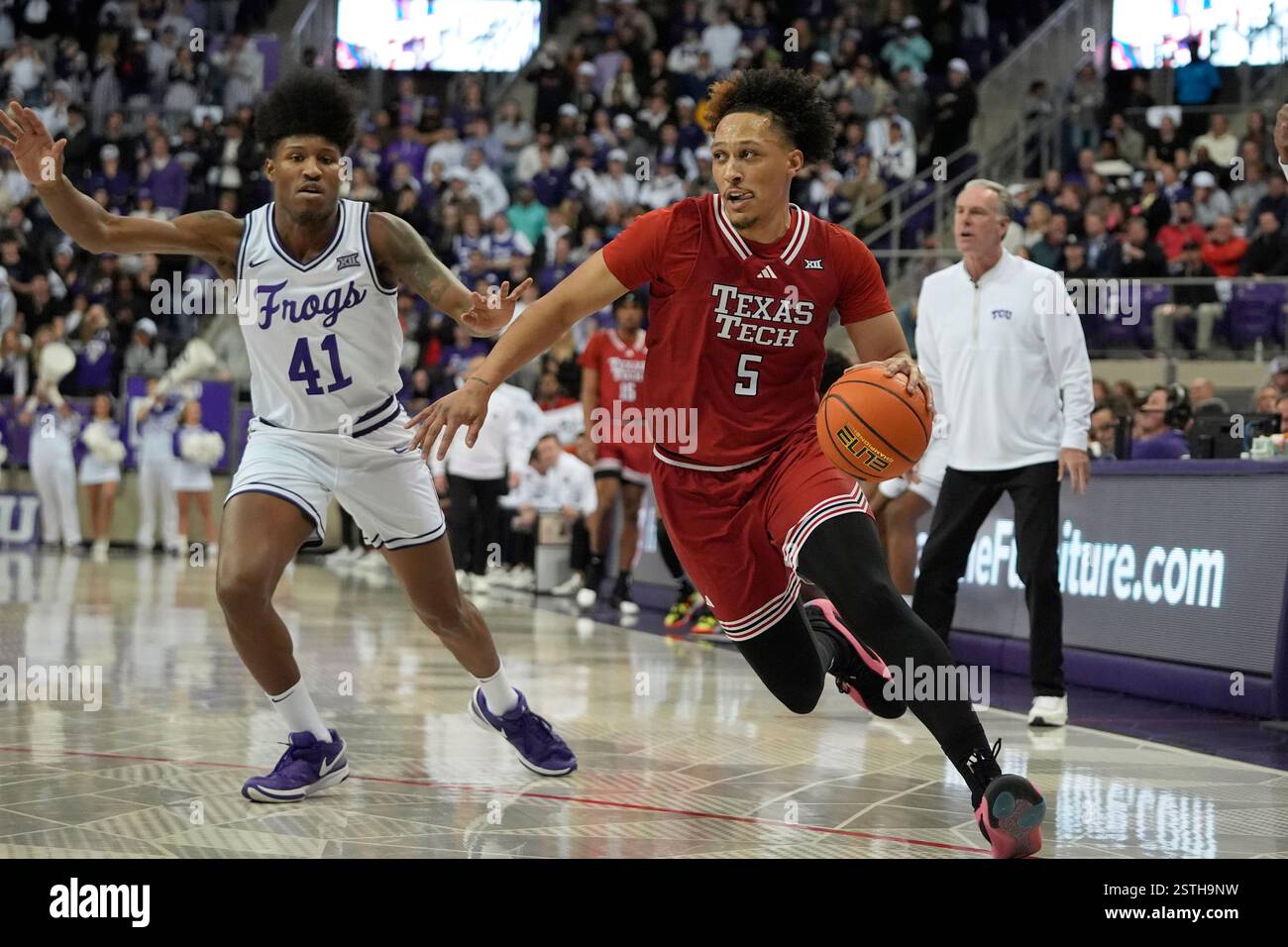 Texas Tech forward Darrion Williams (5) drives past TCU guard Jace ...