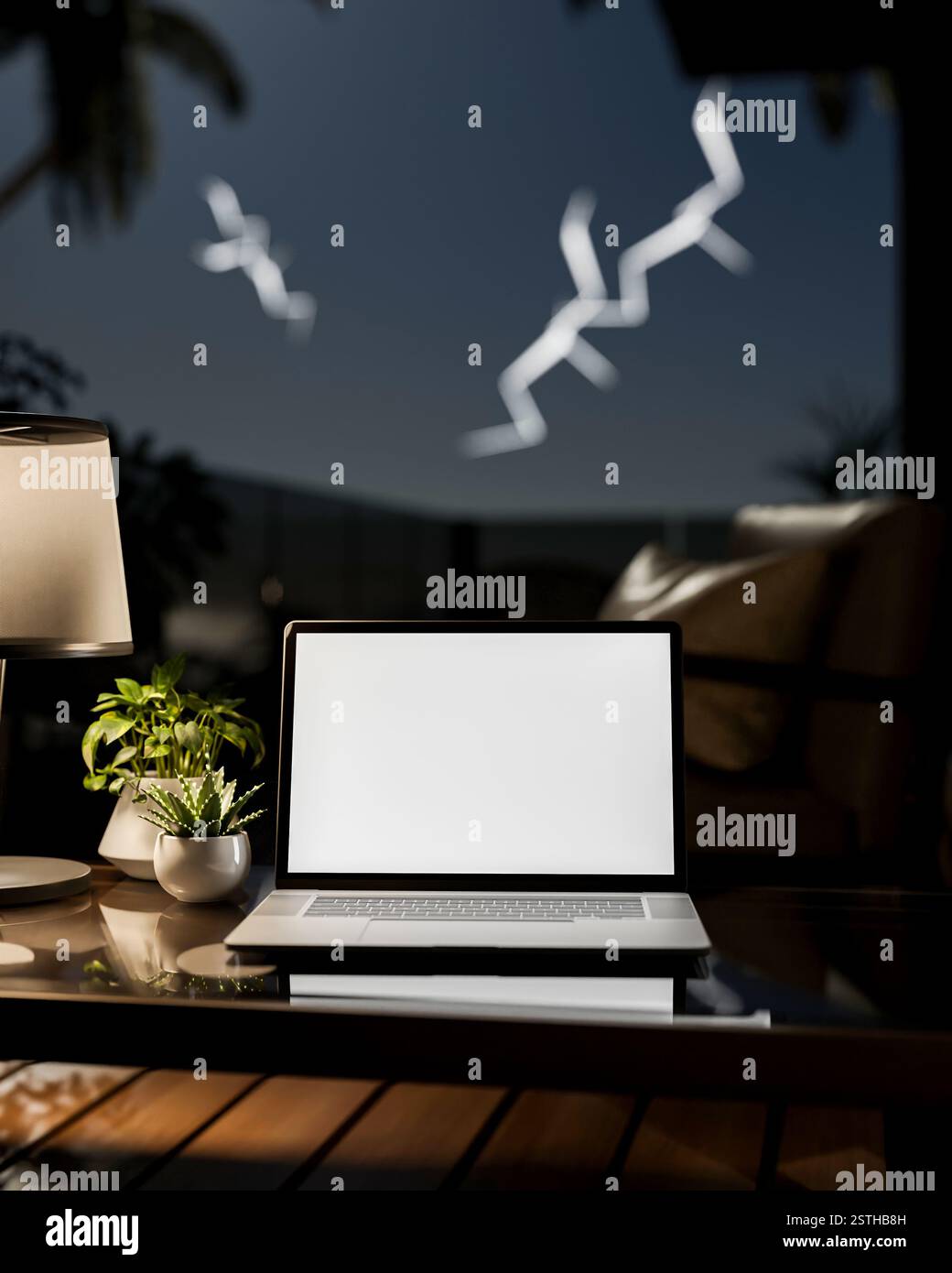The front view of white screen laptop on glass table with decorative ...