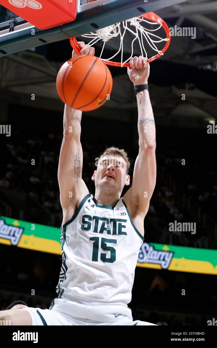 Michigan State center Carson Cooper dunks during the second half of an ...