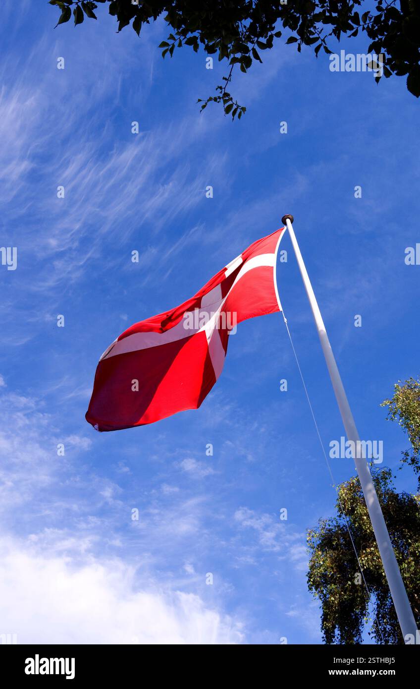 Flags: The Danish national flag "Danebrog" is fluttering in the gusty ...