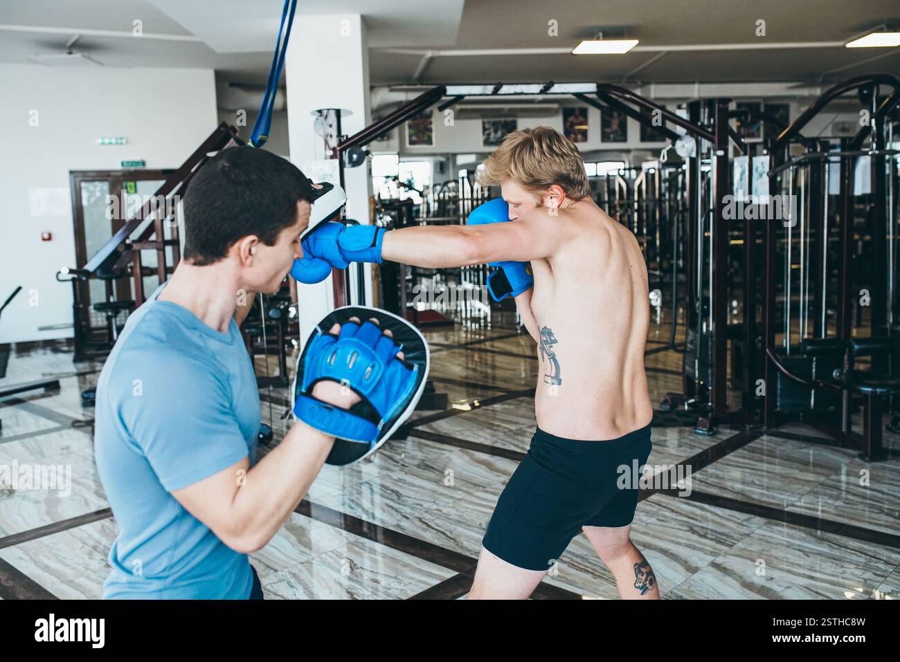 Men practicing boxing in gym Stock Photo - Alamy