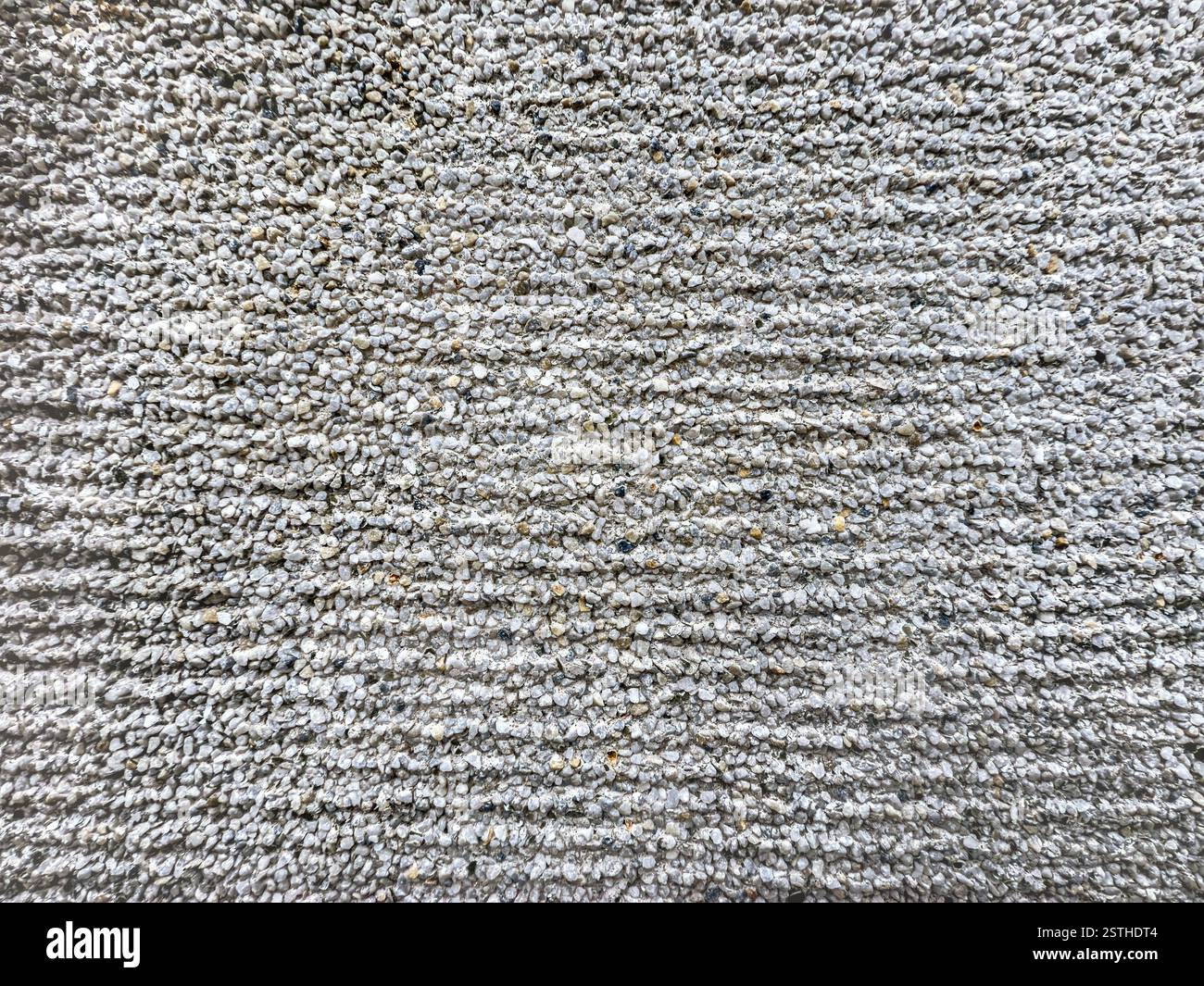 facade wall with horizontal striped rough surface. ribbed texture for ...