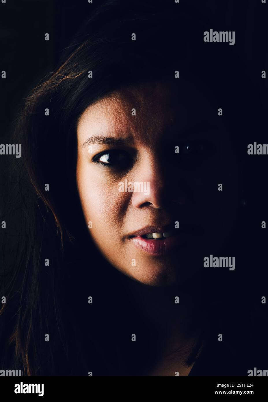 Moody portrait of asian woman Stock Photo - Alamy