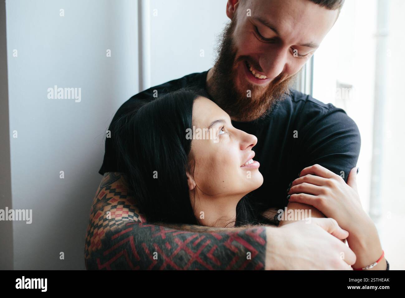 Stylish couple embraces hi-res stock photography and images - Alamy