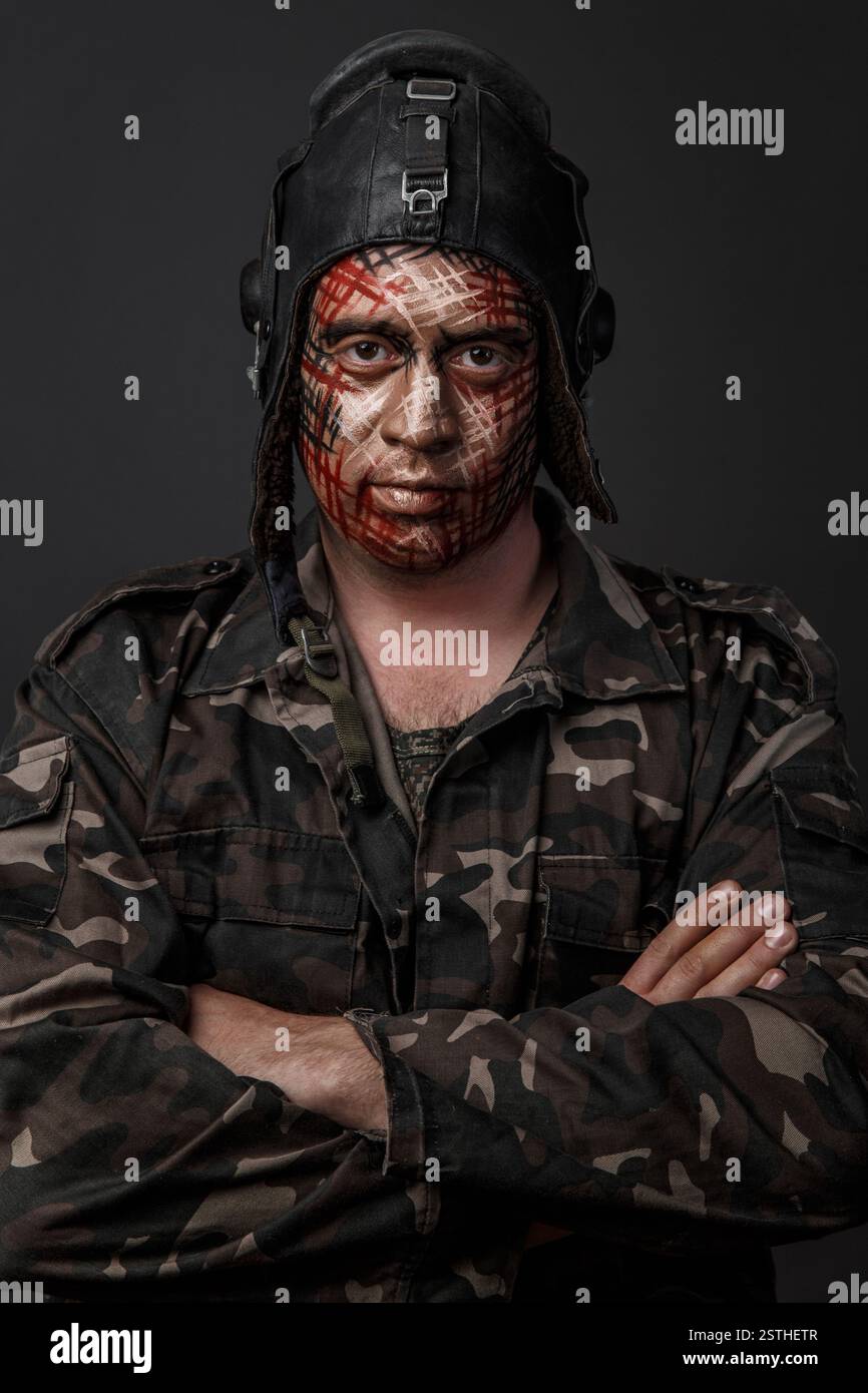Portrait of Brutal Man with Creative Military Style Camouflage. Face ...