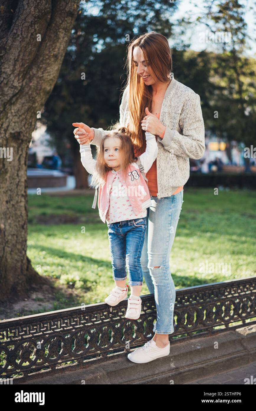 Mom and daughter are having fun Stock Photo - Alamy