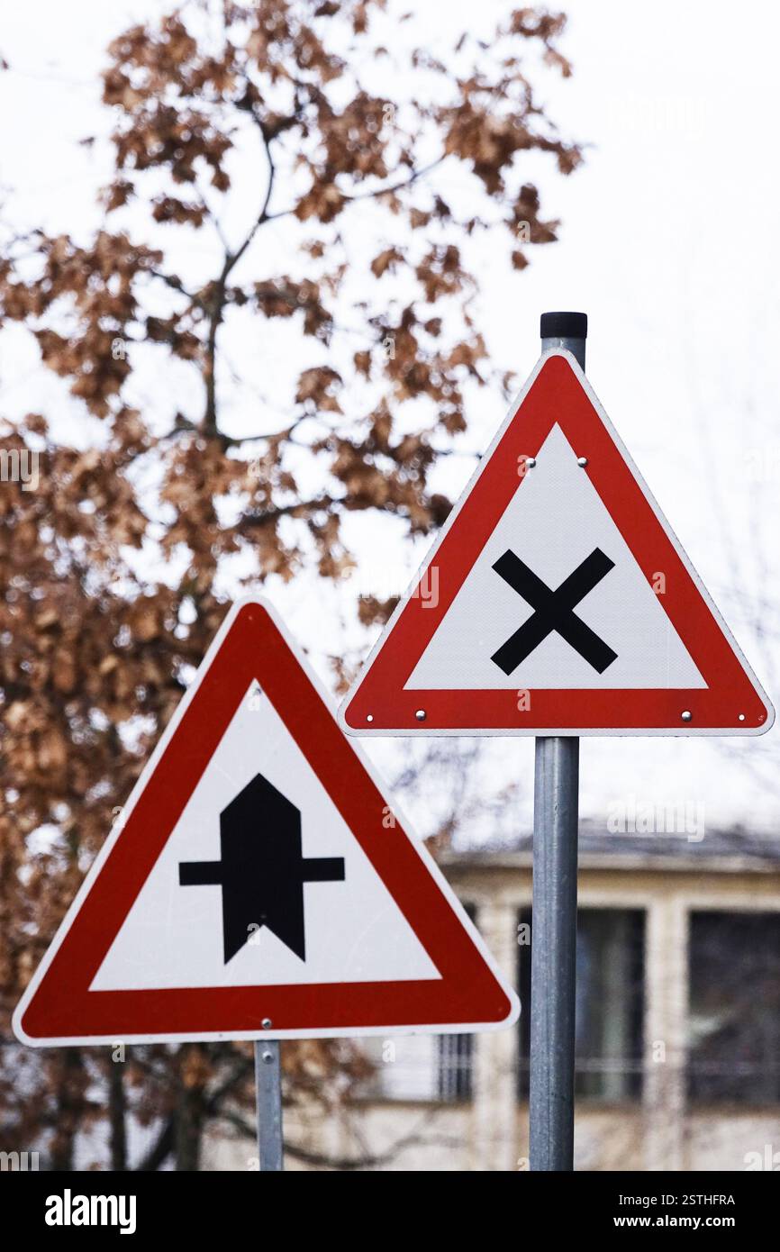 Confusing traffic signs at a road junction, Germany, Europe Stock Photo ...