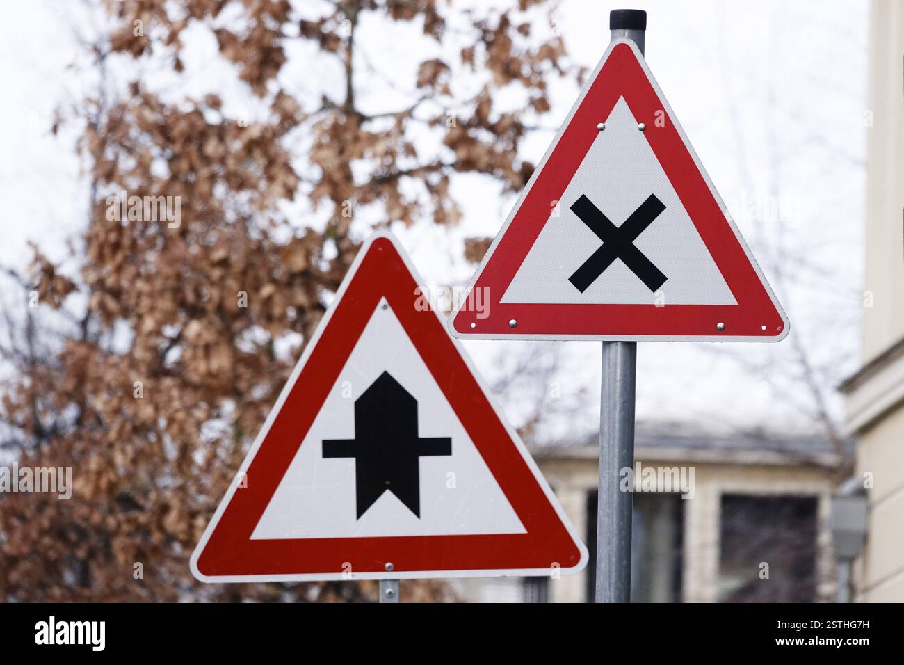 Confusing traffic signs at a road junction, Germany, Europe Stock Photo ...