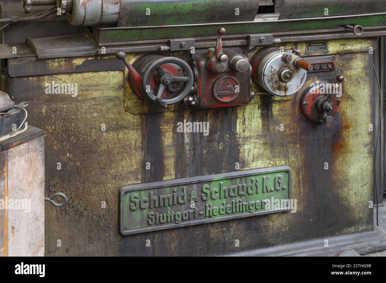 Detail with company sign of a workbench in the production hall of ...
