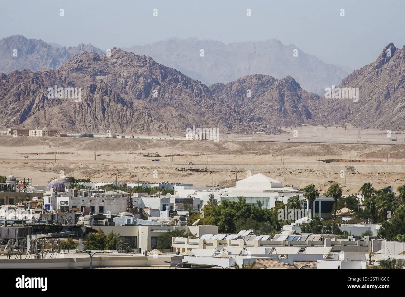 City skyline with modern and traditional buildings set against a ...