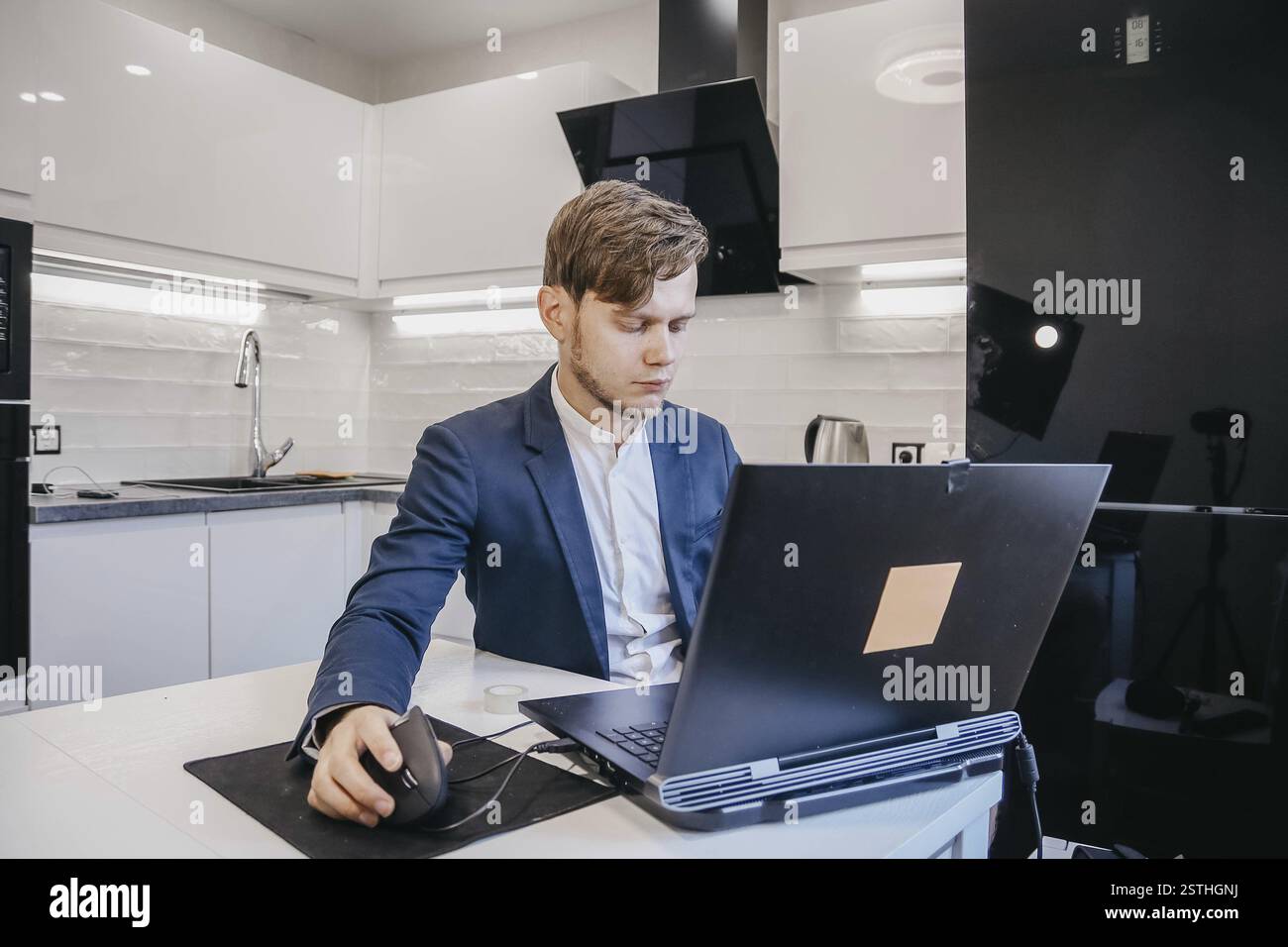 Working on laptops in modern hi-res stock photography and images - Alamy