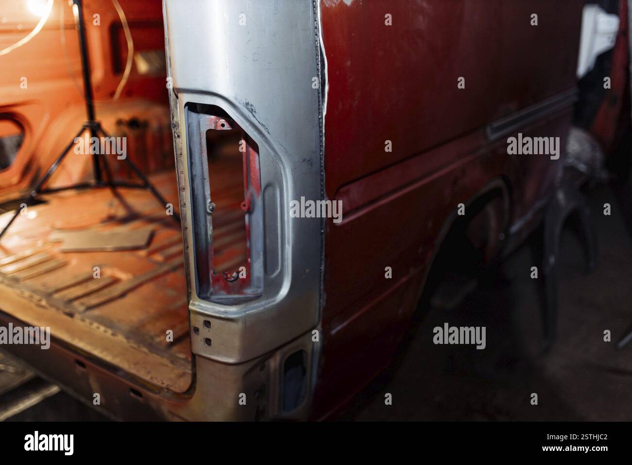 Close-up of a van's rear panel undergoing restoration and metalwork ...