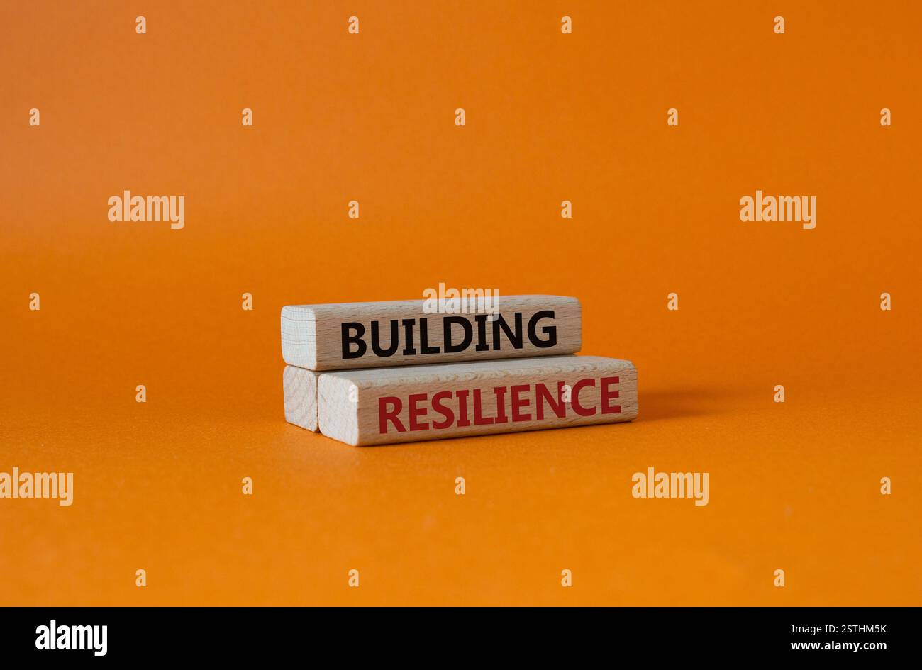 Building resilience symbol. Wooden blocks with words Building ...