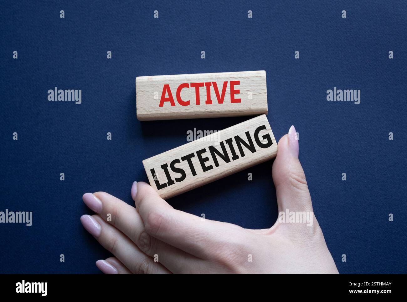 Active listening symbol. Wooden blocks with words Active listening ...
