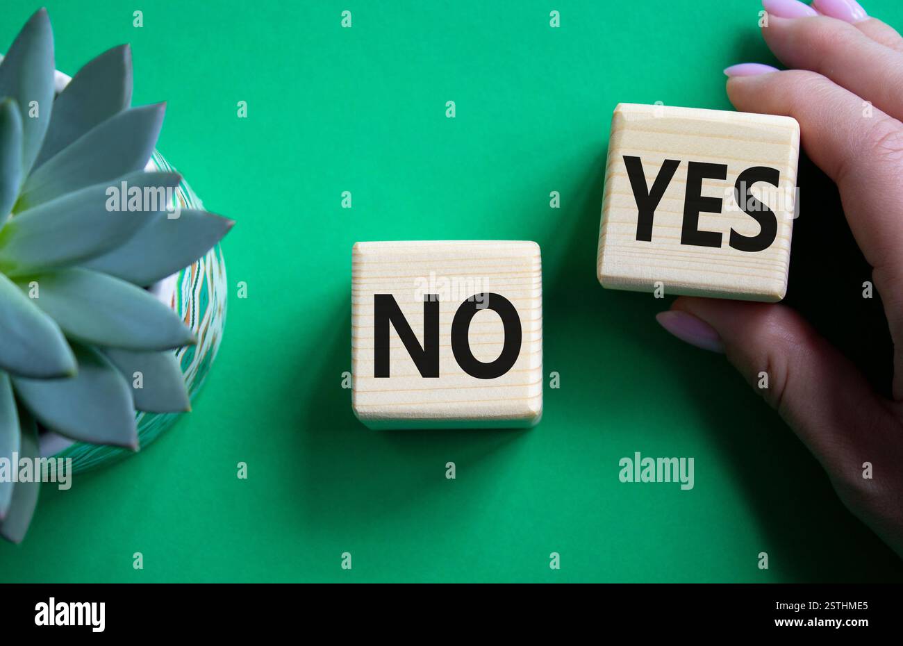 Yes vs No symbol. Businessman hand is making a choice between YES and ...