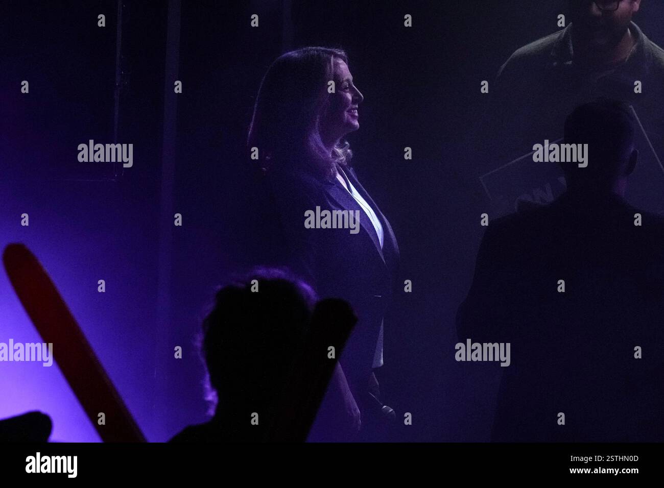 Ontario NDP Leader Marit Stiles waits to be introduced before taking ...