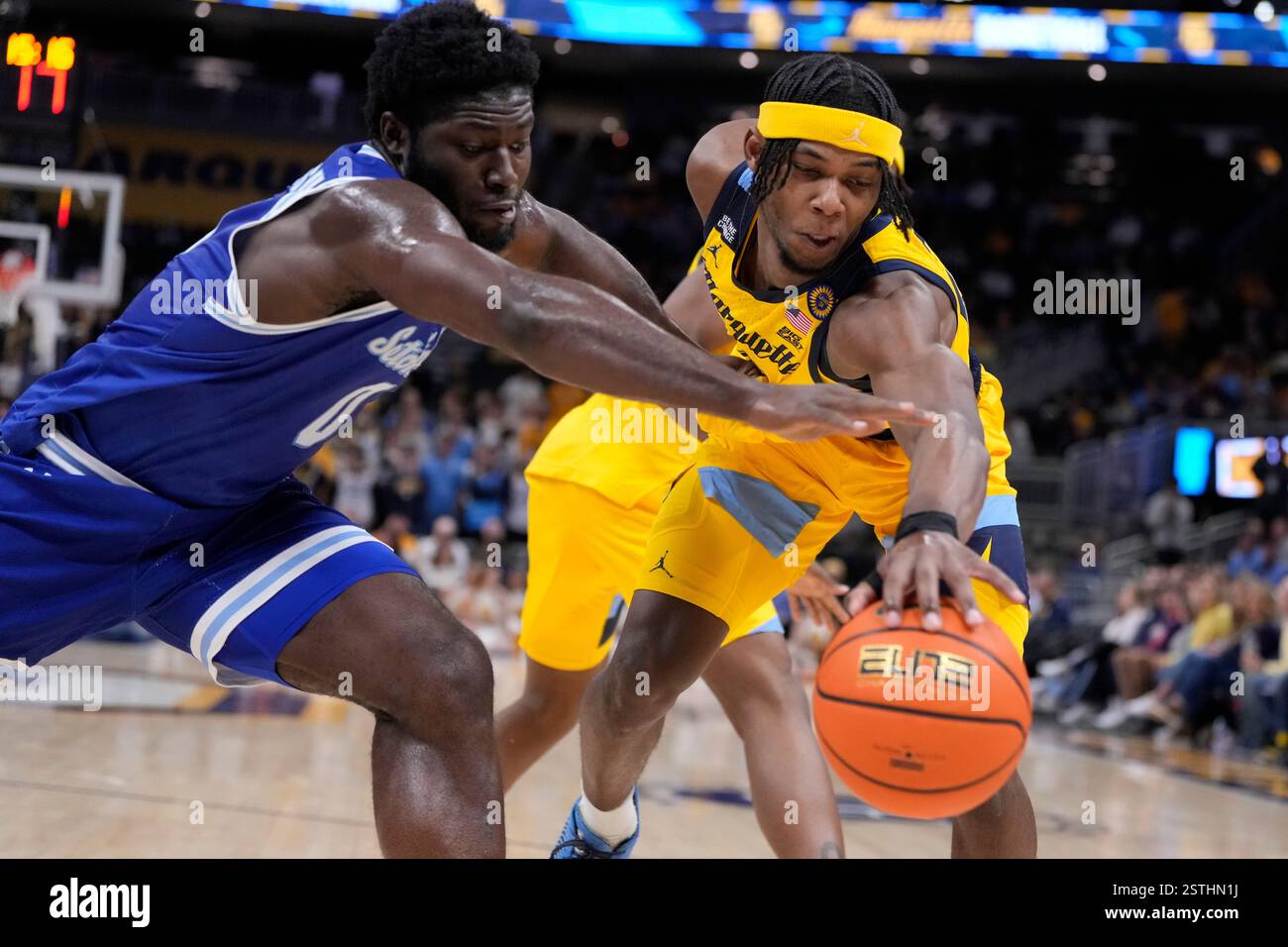 Marquette's Chase Ross and Seton Hall's Dylan Addae-Wusu go after a ...