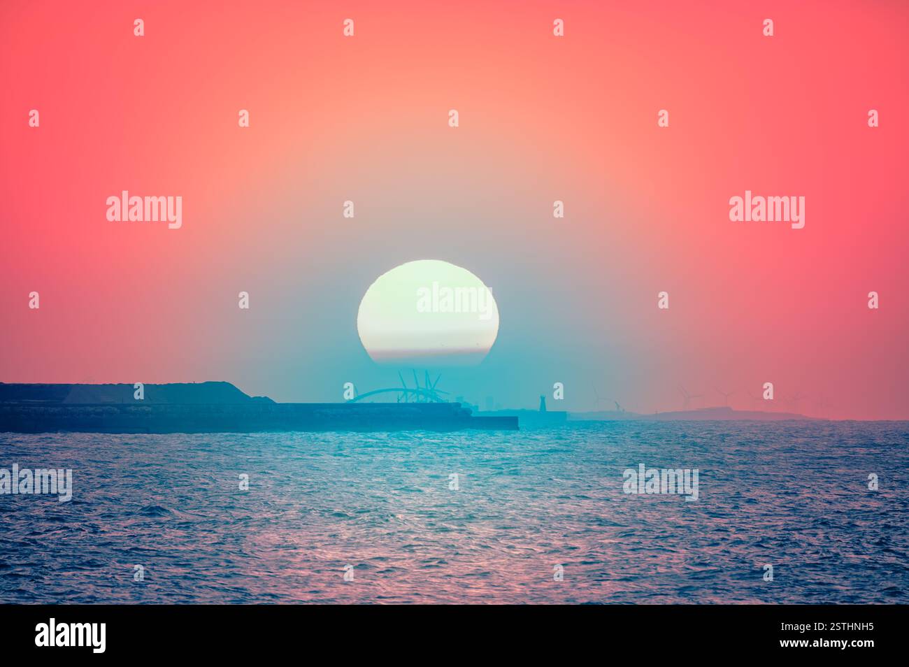 A stunning sunset over the Tamsui sea with vibrant colors blending in ...
