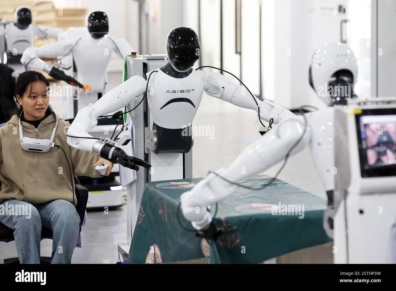 **CHINESE MAINLAND, HONG KONG, MACAU AND TAIWAN OUT** Engineers debug and train humanoid robots ...