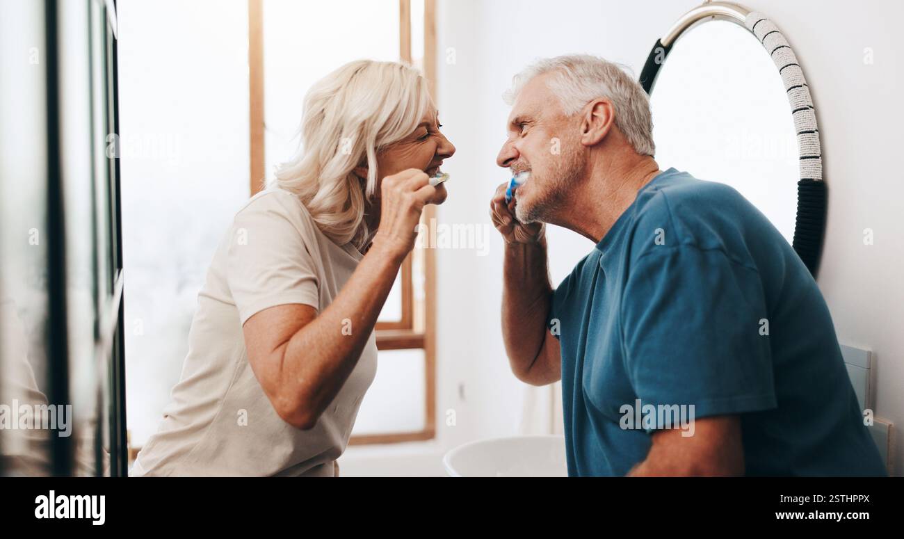 Cleaning, senior couple and brushing teeth for hygiene, smile or ...