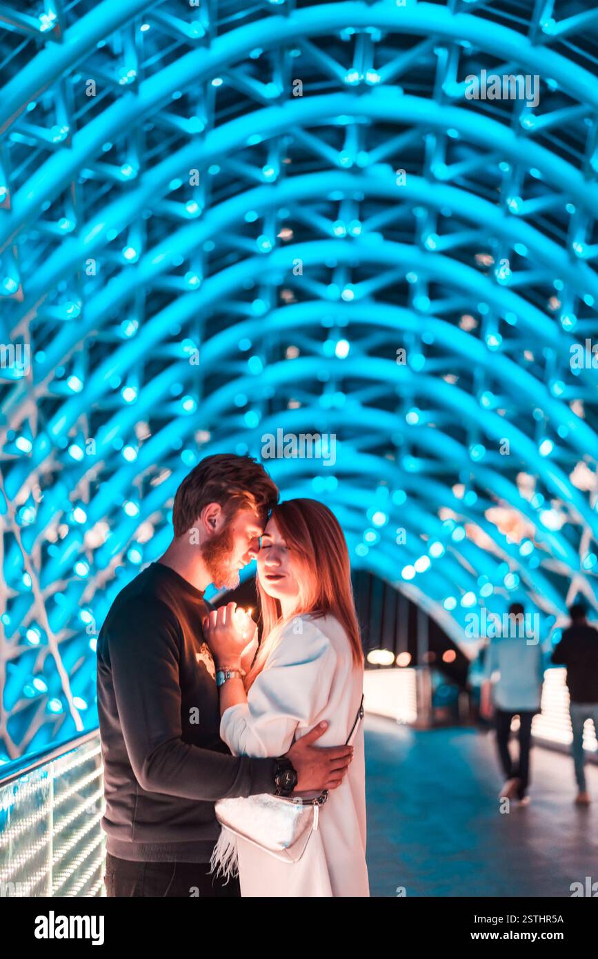Loving couple on bridge hi-res stock photography and images - Alamy