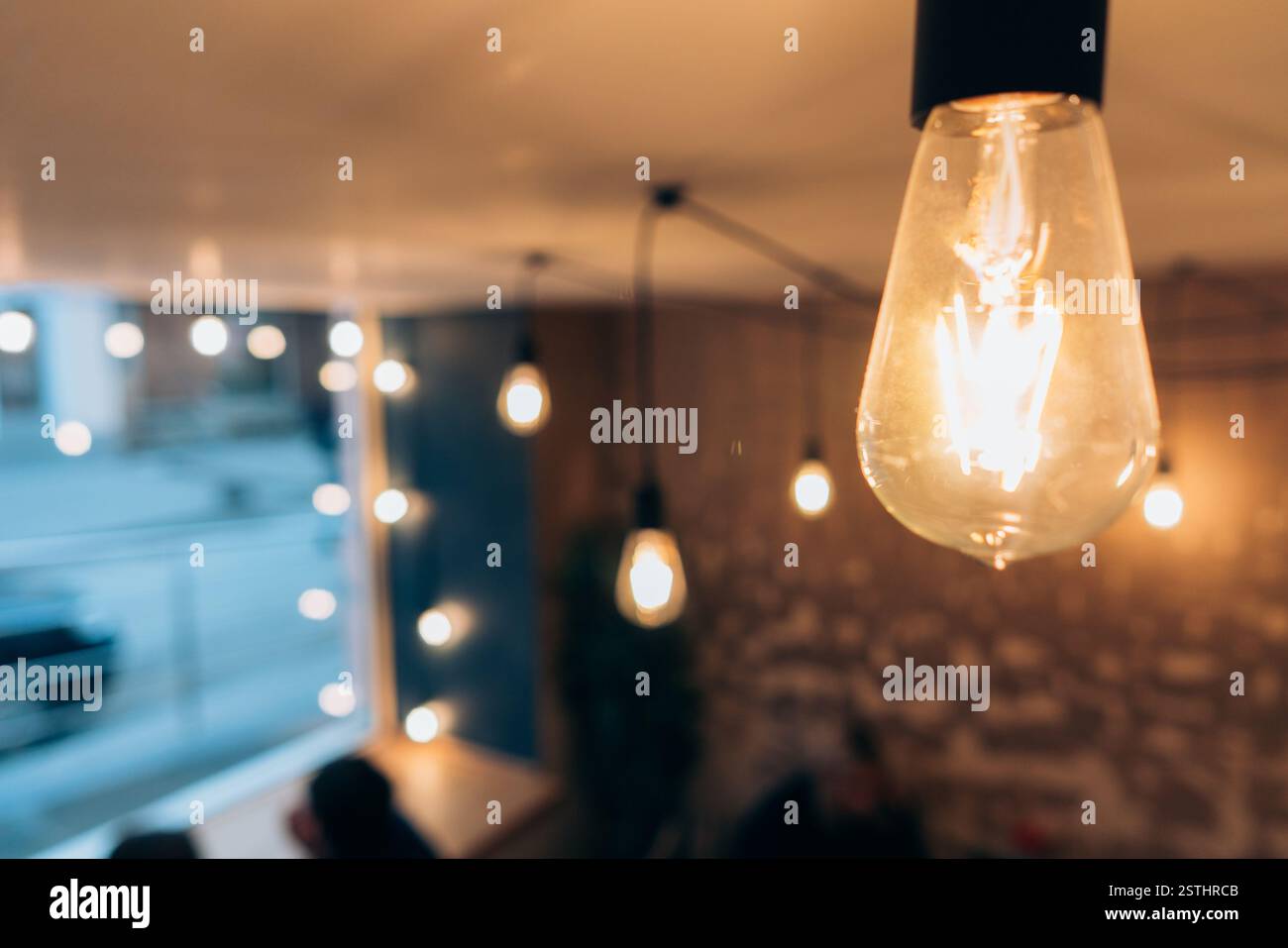 Burning incandescent edison lamp hi-res stock photography and images ...