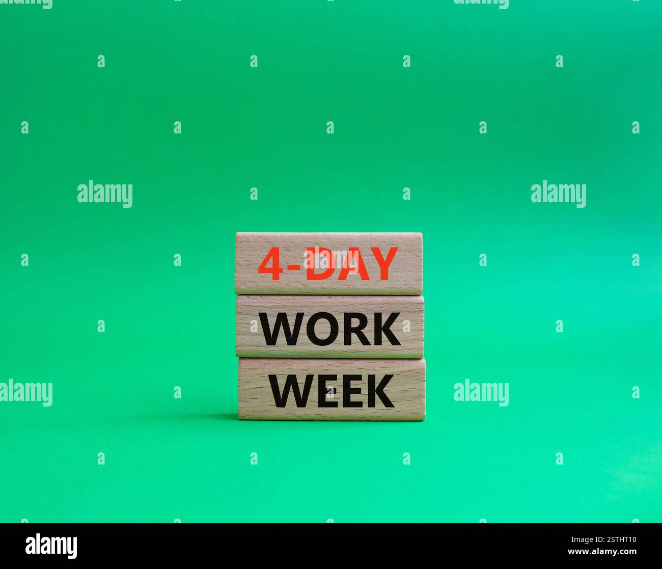 4-day work week symbol. Concept words 4-day work week on wooden blocks ...
