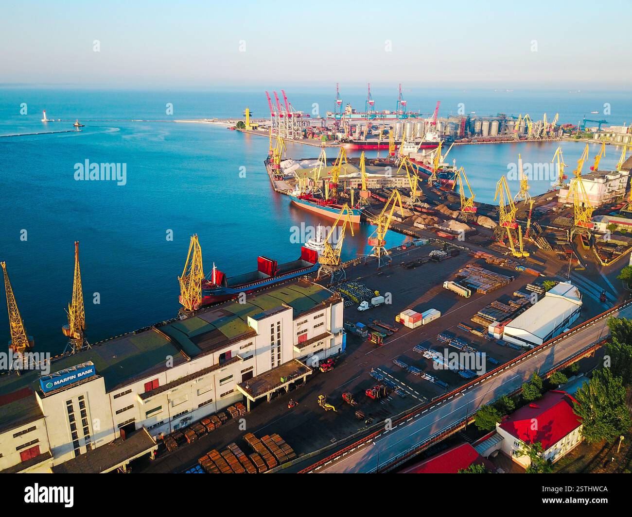 City port on sunrise. Urban aerial view. Odessa Marine Trade Port is ...