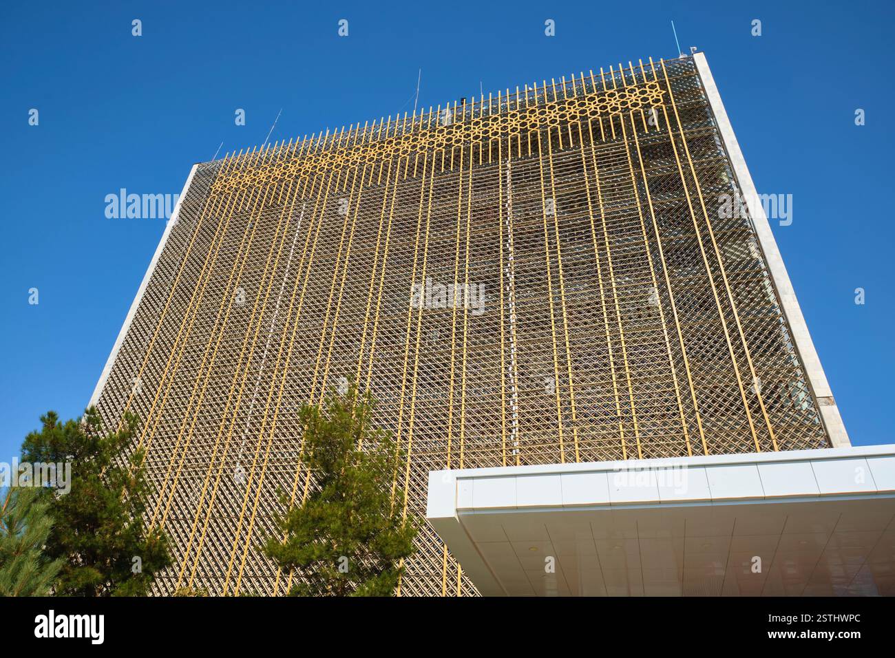 A Midcentury modern Soviet office, government building with gold metal ...