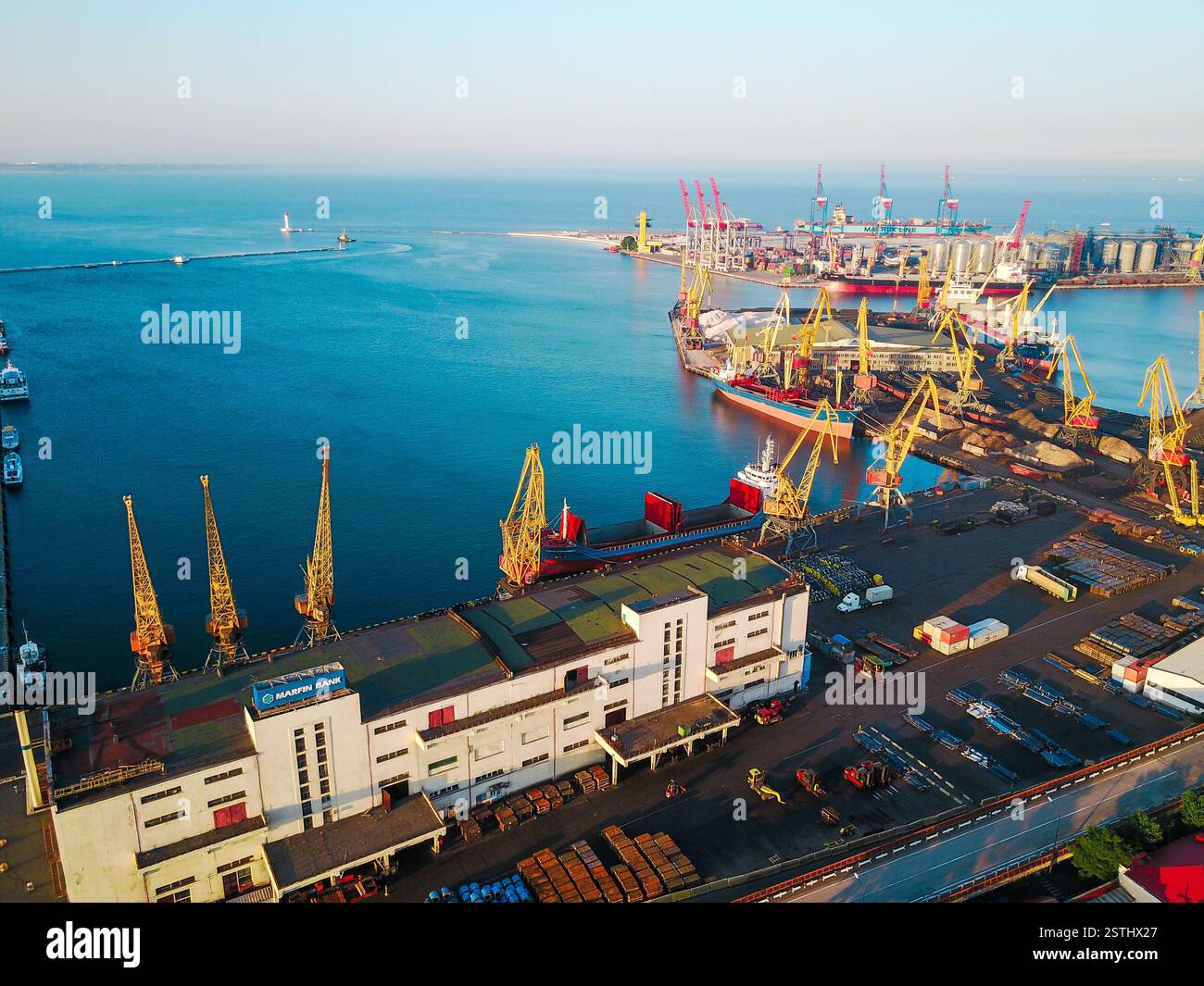 City port on sunrise. Urban aerial view. Odessa Marine Trade Port is ...