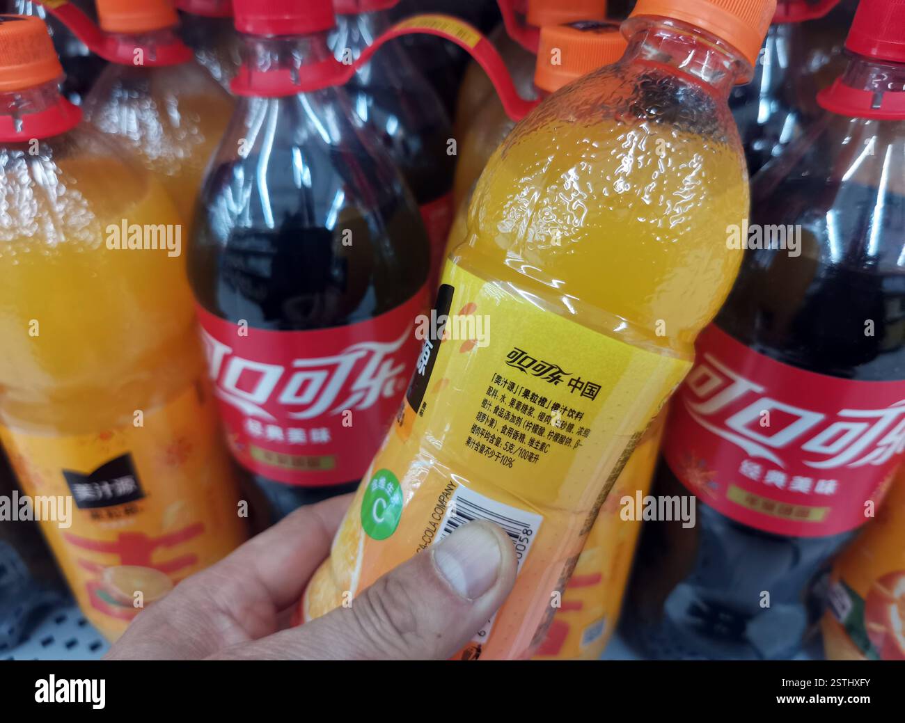 Coca-Cola drinks are seen at a supermarket in Yichang, Hubei province ...