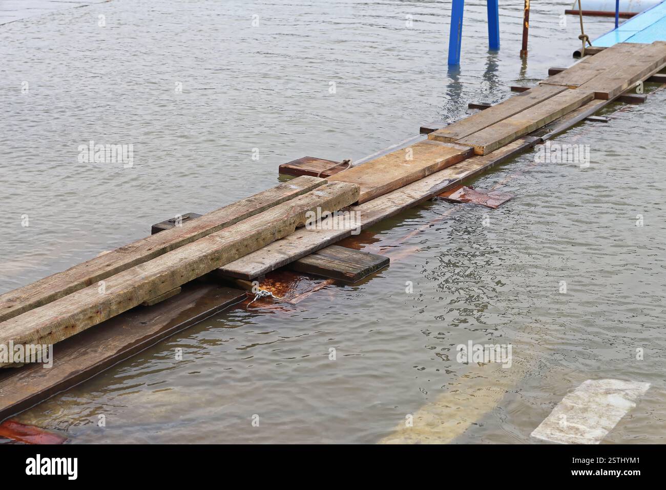 Floating Plank Boards Bridge Over Flood Water Stock Photo - Alamy