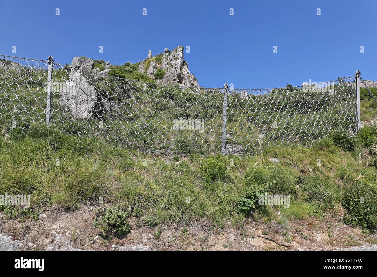 Steel net at slope hill for road protection hi-res stock photography ...
