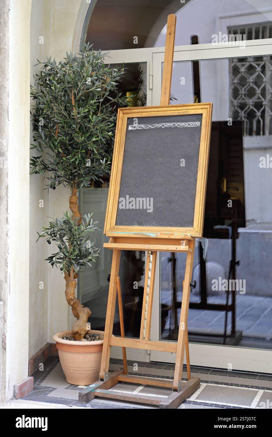 Easel Menu Frame in Front of Restaurant Stock Photo - Alamy