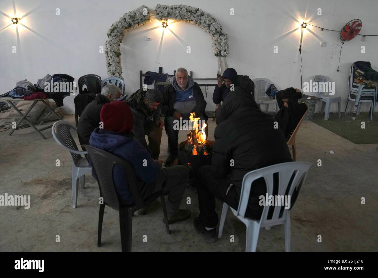 Palestinians who fled the Israeli army operation in the Nur Shams ...