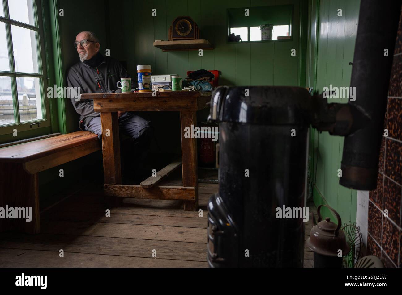 Peter Booij looks out of the centuries-old Gekroonde Poelenburg ...
